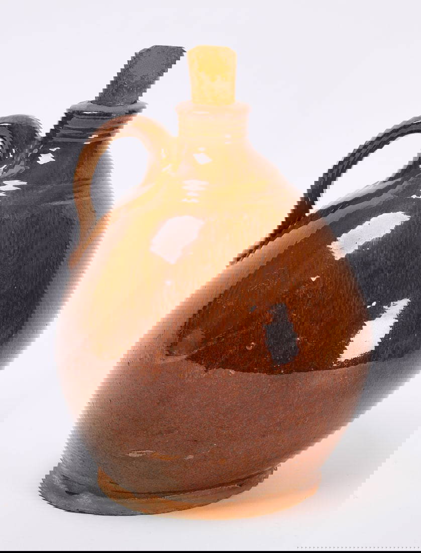Redware Jug With Handle And Cork Auction