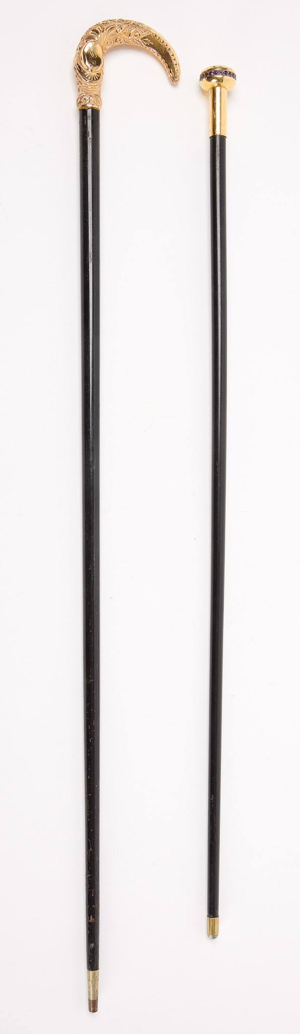 Two Walking Sticks Auction