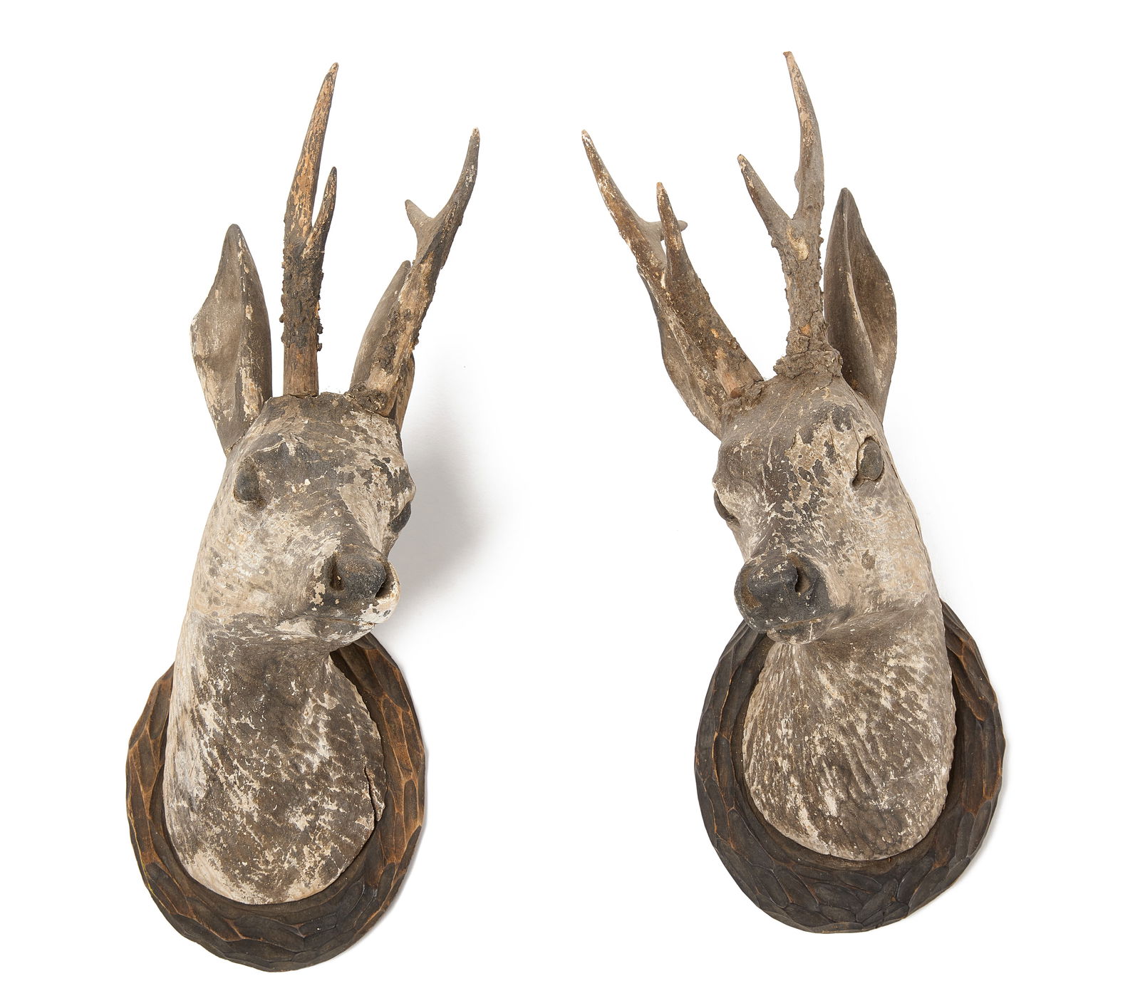 Pair Of Carved Deer Heads Auction