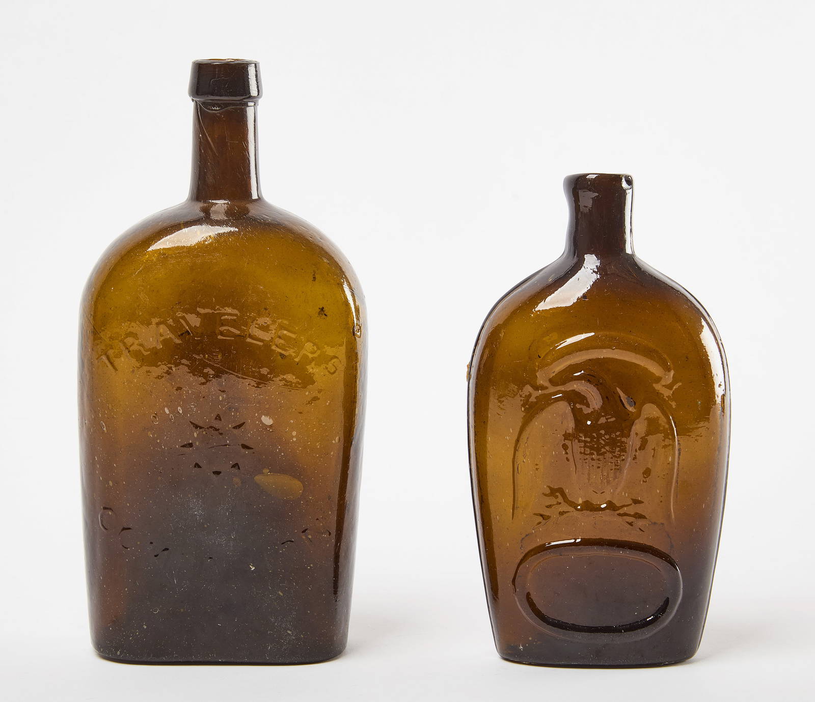 Two Embossed Blown Glass Flasks Auction