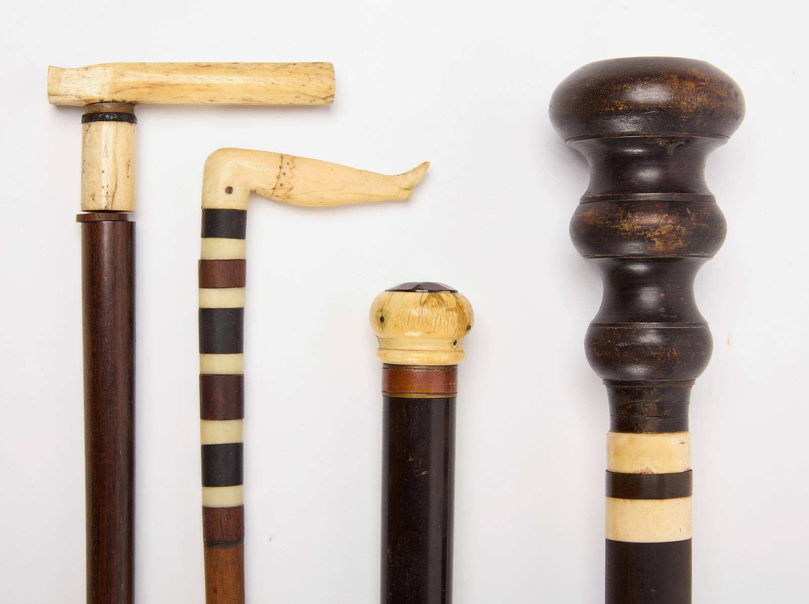 Four Scrimshaw And Maritime Canes Auction