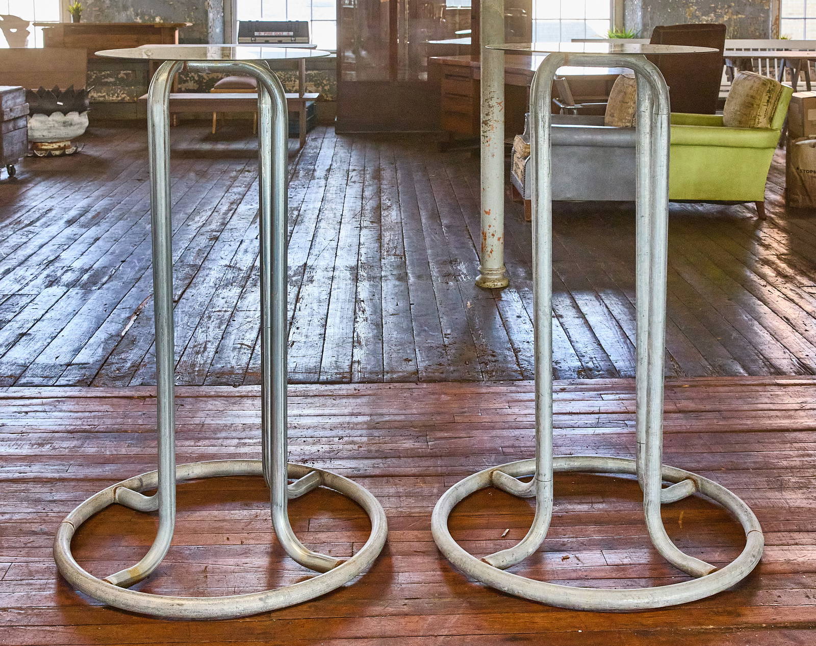 Pair Of Tubular Steel Stands With Glass Tops Auction