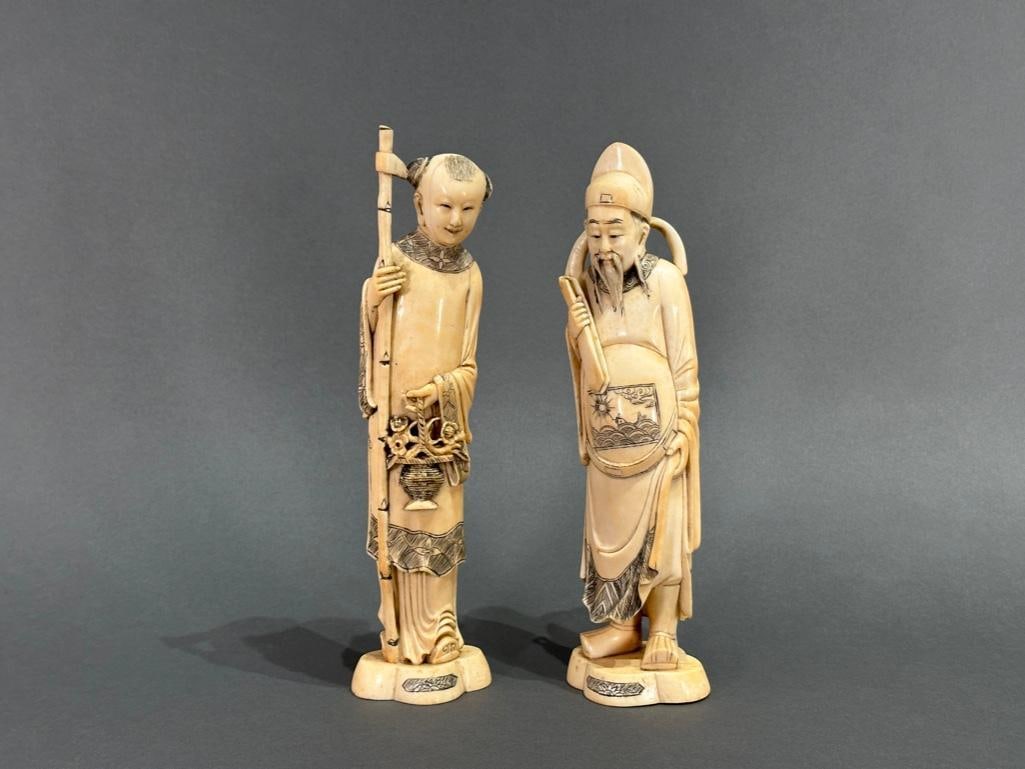 Two Chinese Carved Bone Figures Of Immortals Auction