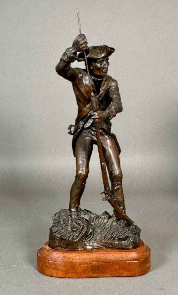 Rusty Phelps Bronze Figure, Revolutionary Soldier Loading A Rifle Auction