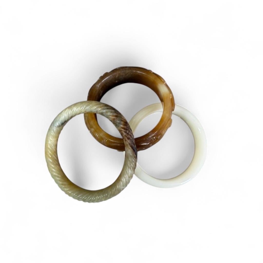 Three Chinese Jade Bangles Auction