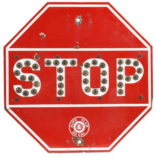 Red Metal Stop Sign With Glass Reflective Marbles.