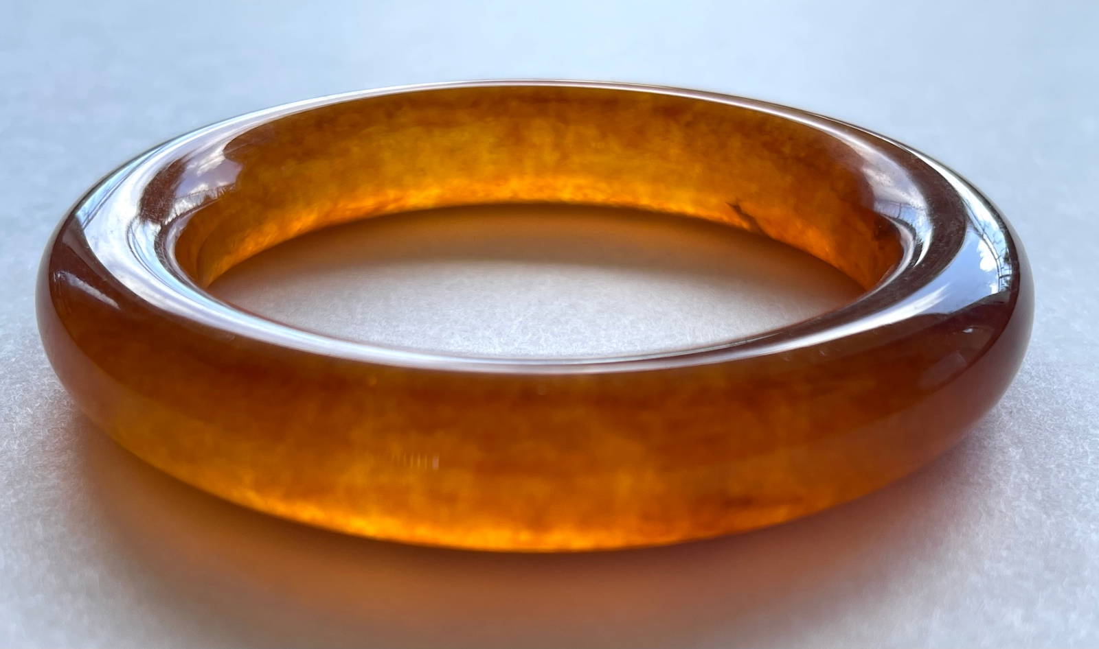 A Chinese Carved Bangle Auction