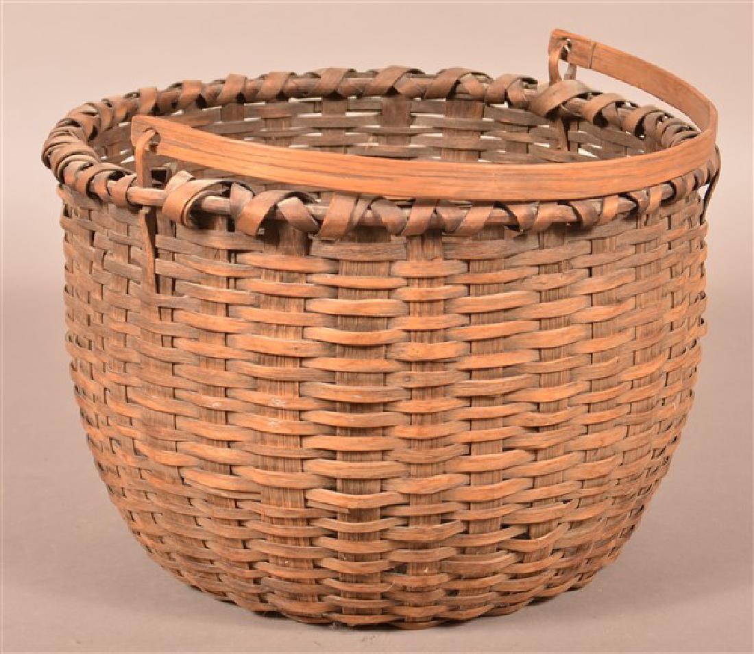 Pennsylvania Woven Oak Splint Swing Handle Basket.