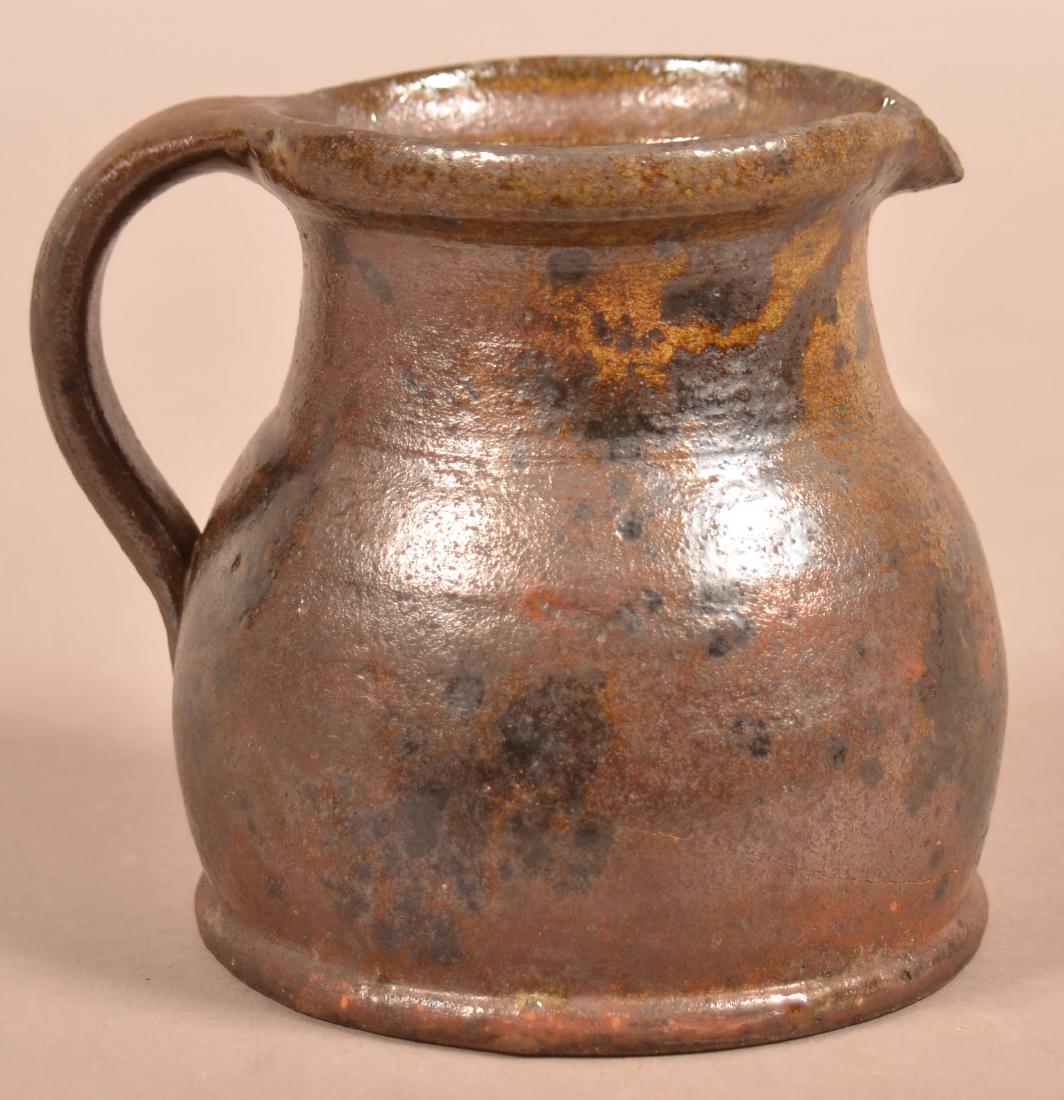 19th Century Redware Pottery Pitcher.