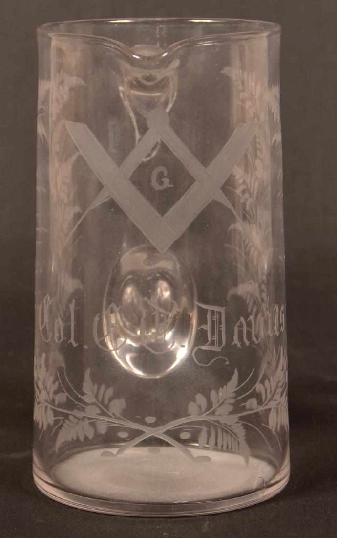 Engraved Colorless Glass Pitcher with Masonic Emblem.