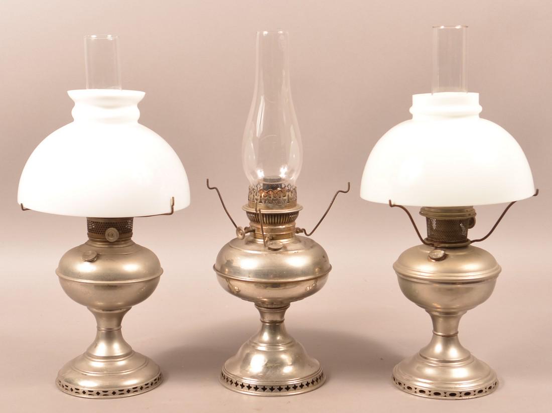 Three Nickle Plated Rayo Type Fluid Lamps.