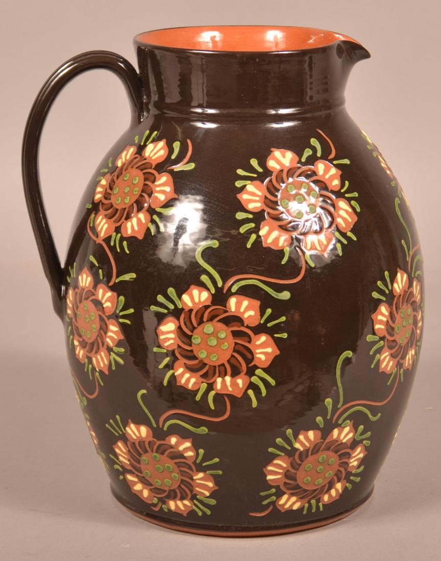 Breininger Redware Pitcher with Sunflowers.