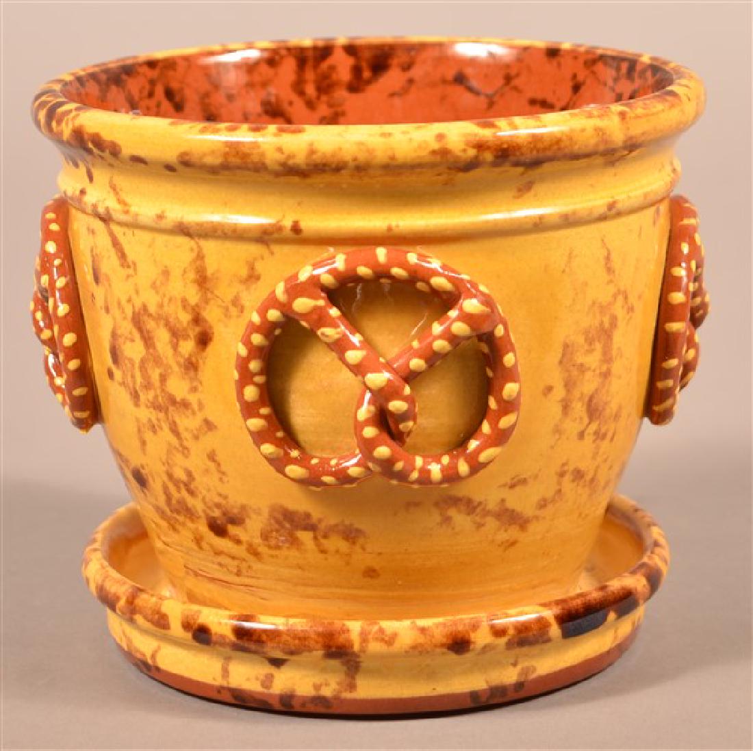 Breininger Redware Pottery Planter. Applied pretzels