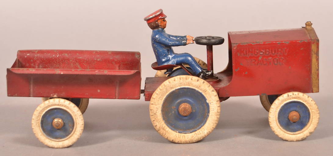 Kingsbury Pressed Steel Wind Up Tractor With Trailer.