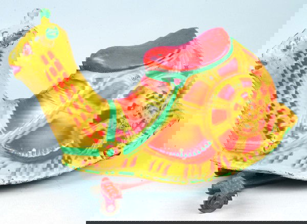 351: Rare Mobo Snail Child's Riding Toy. Molded steel,