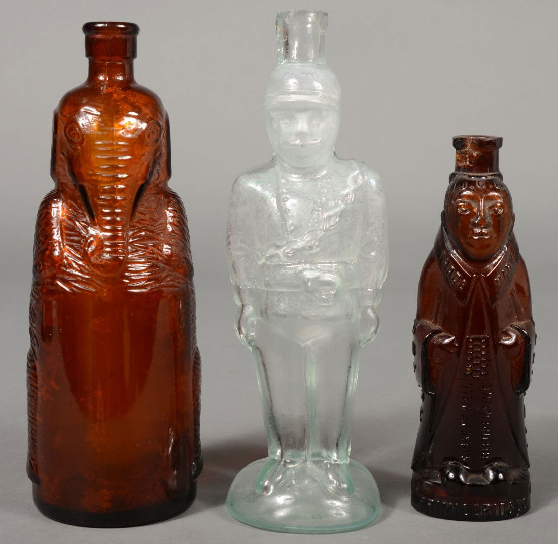 230: Three Figural Bottles; 1st- amber glass elephant f