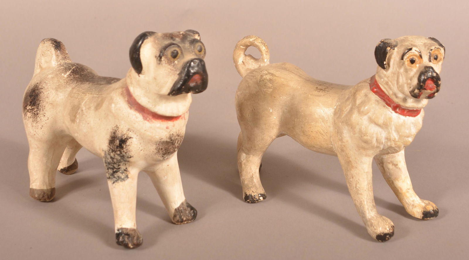 Two Antique Chalkware Pug Dogs.
