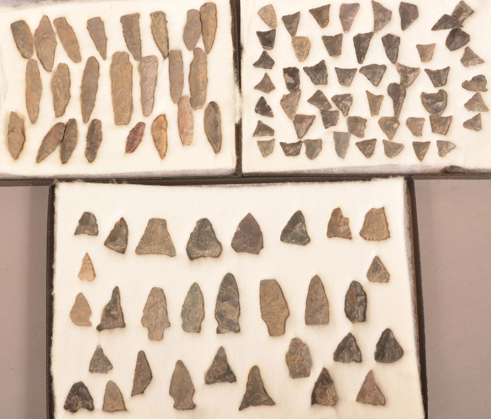 Three Riker Mounts Of Ancient Stone Points. Auction