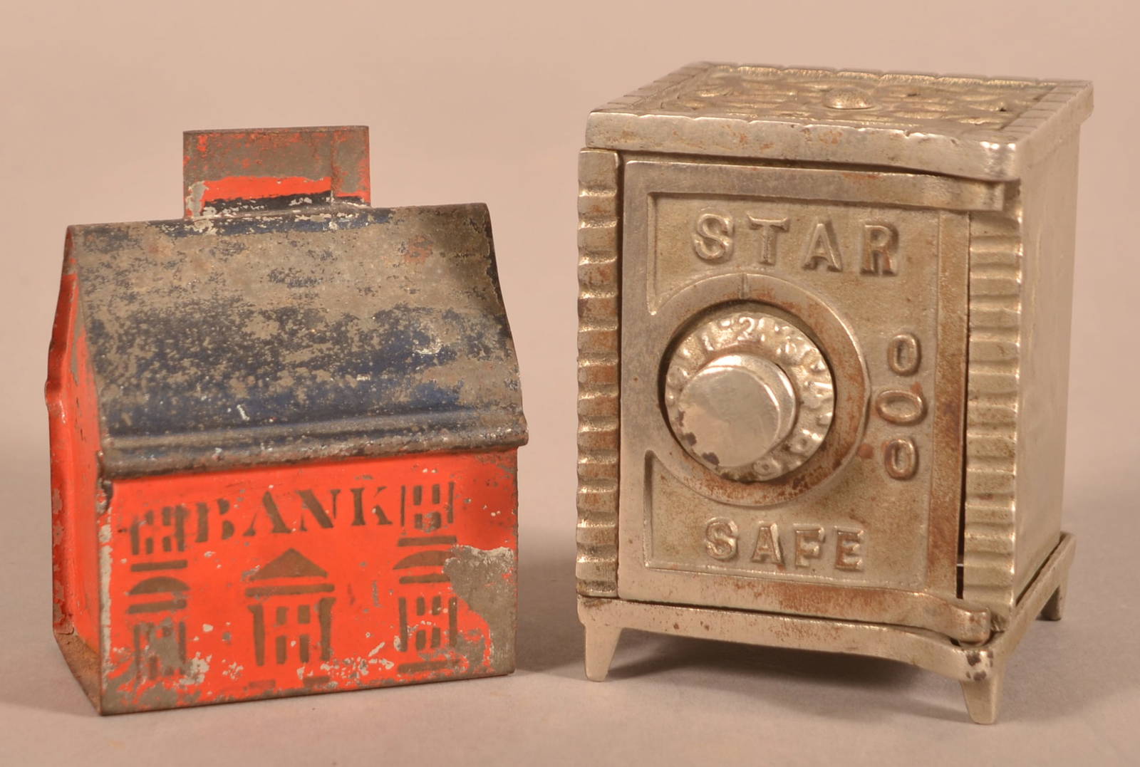 Two Antique Still Banks. Auction