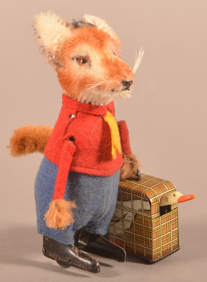 Schuco Fox Carrying Goose Wind Up Toy.