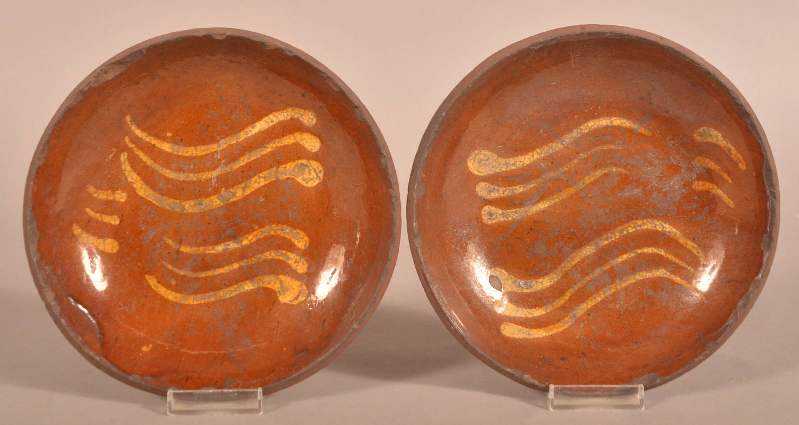 Two Antique Pennsylvania Redware Plates. Auction