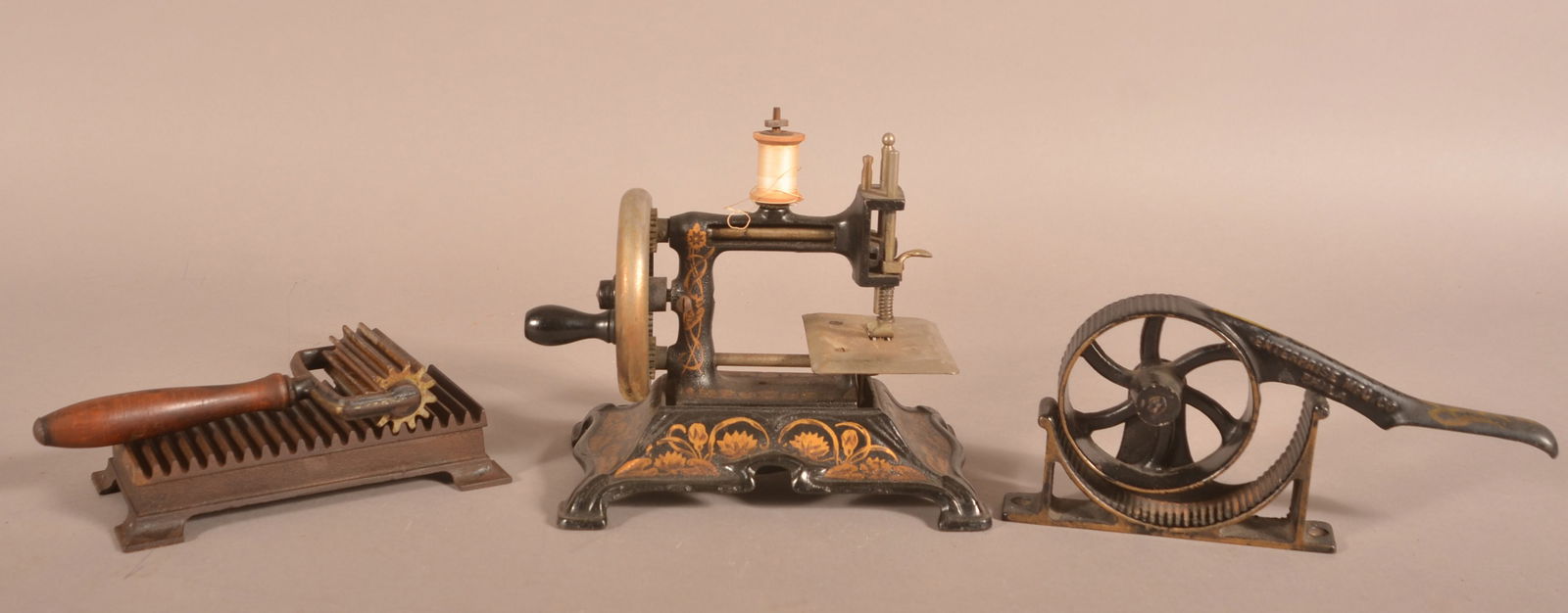 Three Cast Iron Utilitarian Items. Auction