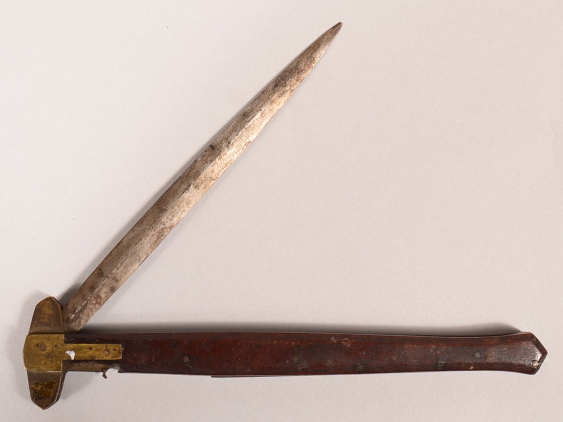 Old hand-made switchblade knife having a thin 6-3/4"