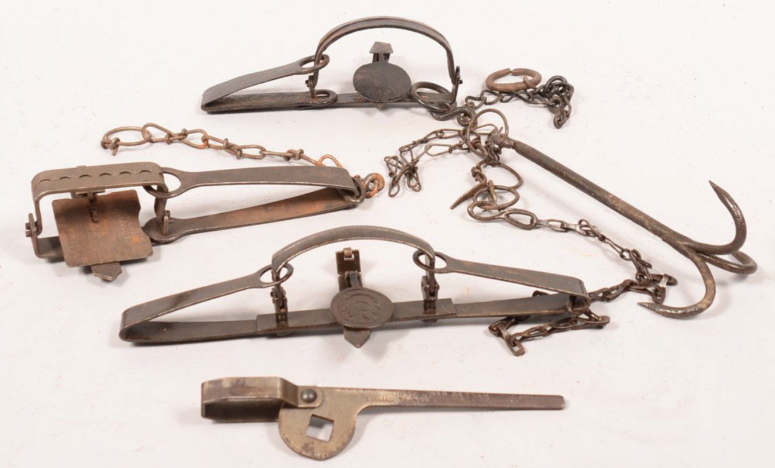 Lot of (3) vintage leg hold steel traps plus a Jiffy