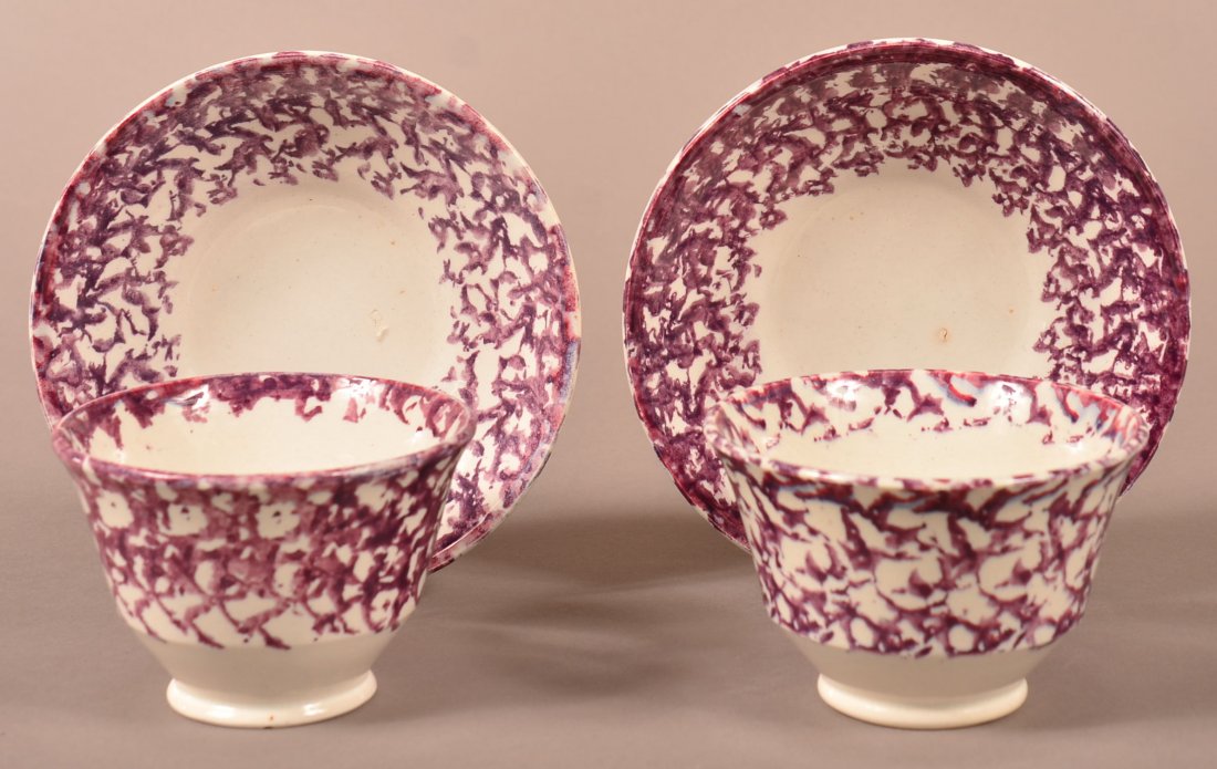 Two Purple Sponge China Cups And Saucers.