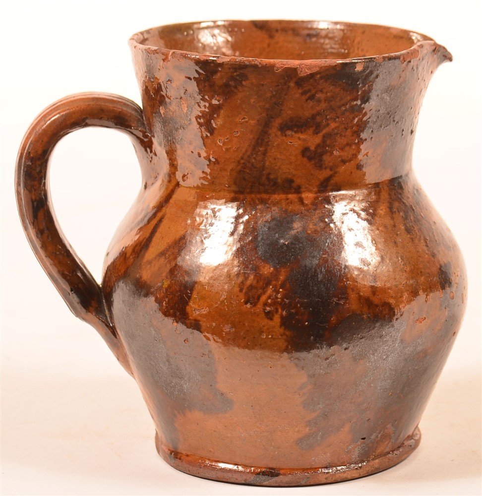 Mottle Glazed Redware Pottery Cream Pitcher.