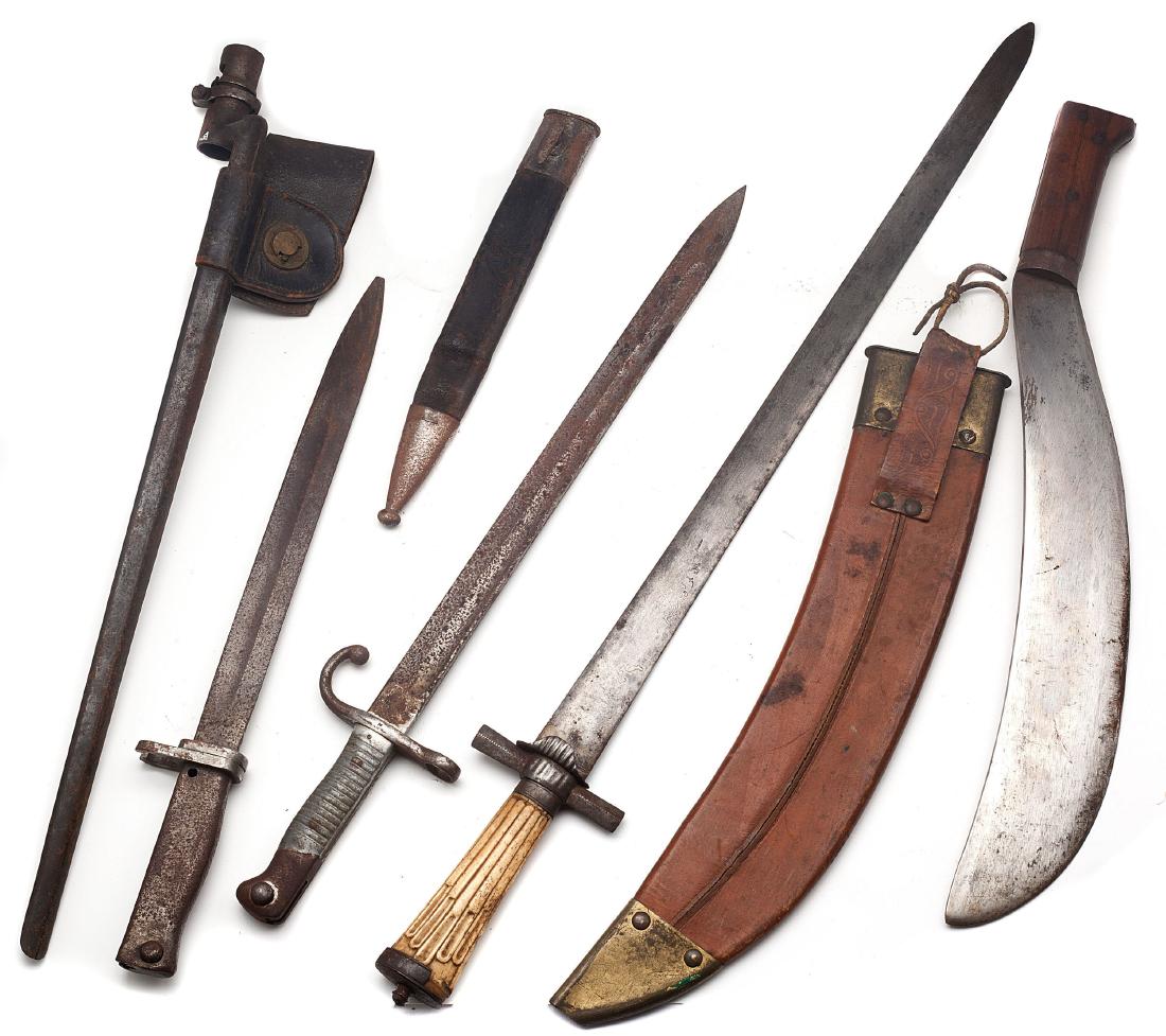 A group of four edged weapons
