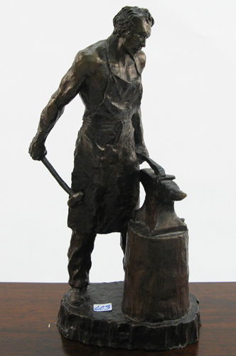 Solid Bronze Figure Depicting A Blacksmith Workin