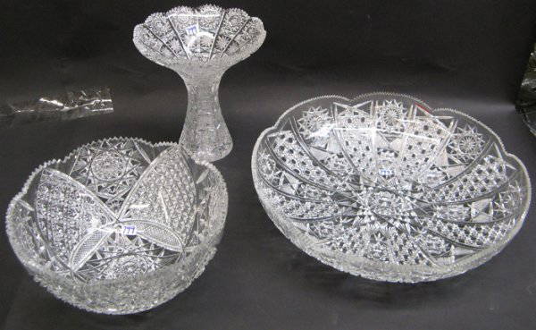Three Pieces Of Heavily Cut Crystal: A Large Roun