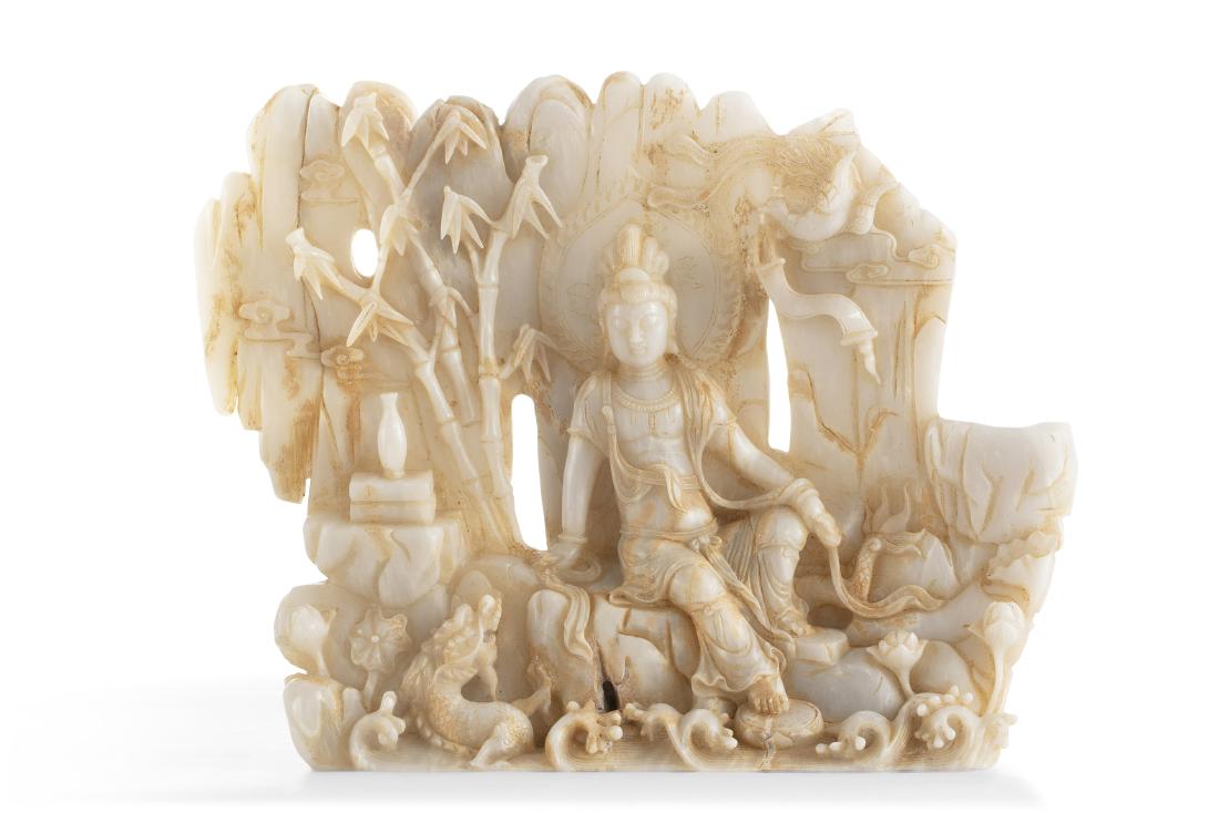 A Chinese carved jade panel