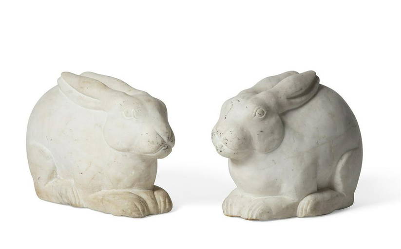 A Pair Of White Marble Models Of Rabbits