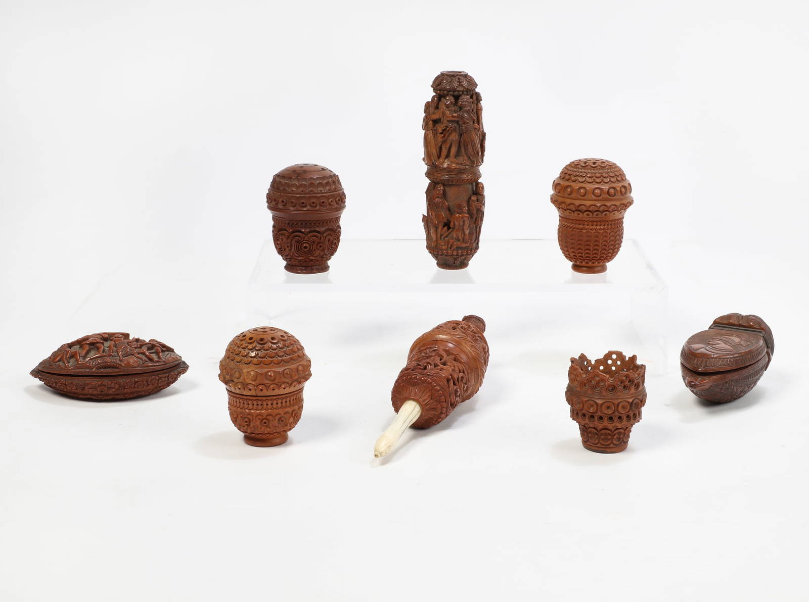 A Collection Of Eight Chinese Carved Nuts Auction