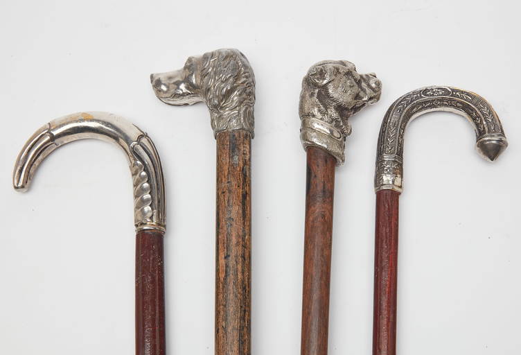Four Metalware Mounted Walking Sticks