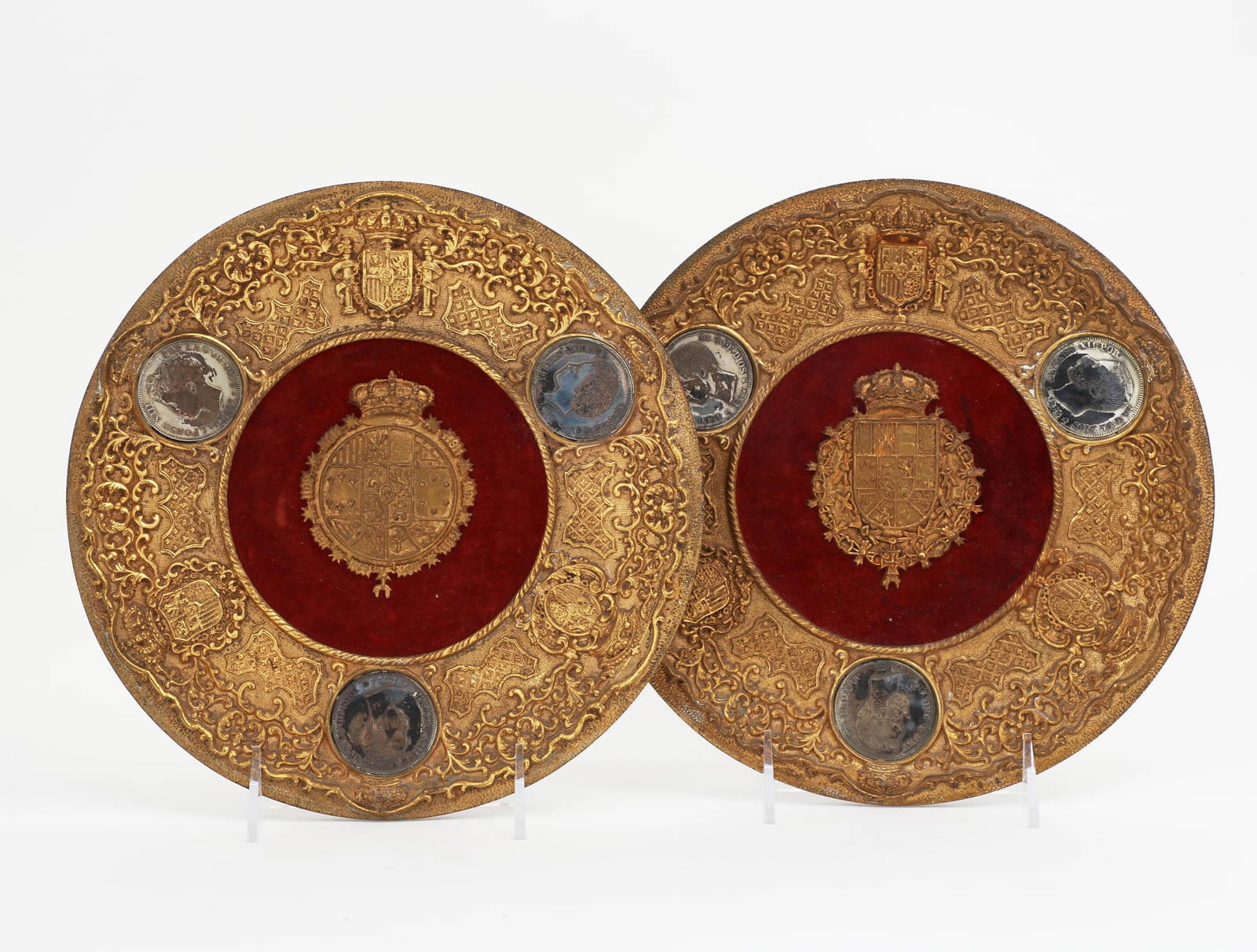A Pair Of Spanish Gilt Metal Armorial Dishes Auction