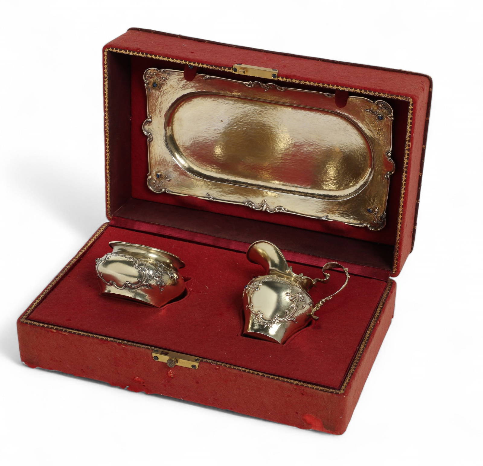 A Three Piece German Jewel Inset Silver Gilt Cream And Sugar Set Auction