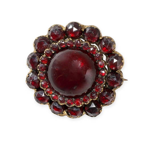 AN ANTIQUE BOHEMIAN GARNET BROOCH set to the centre with a cabochon cut ...