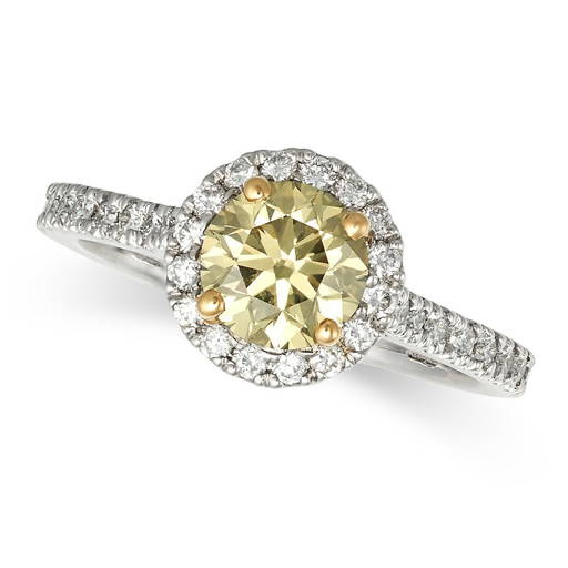 A FANCY BROWN DIAMOND CLUSTER RING in 18ct white gold and platinum, set ...