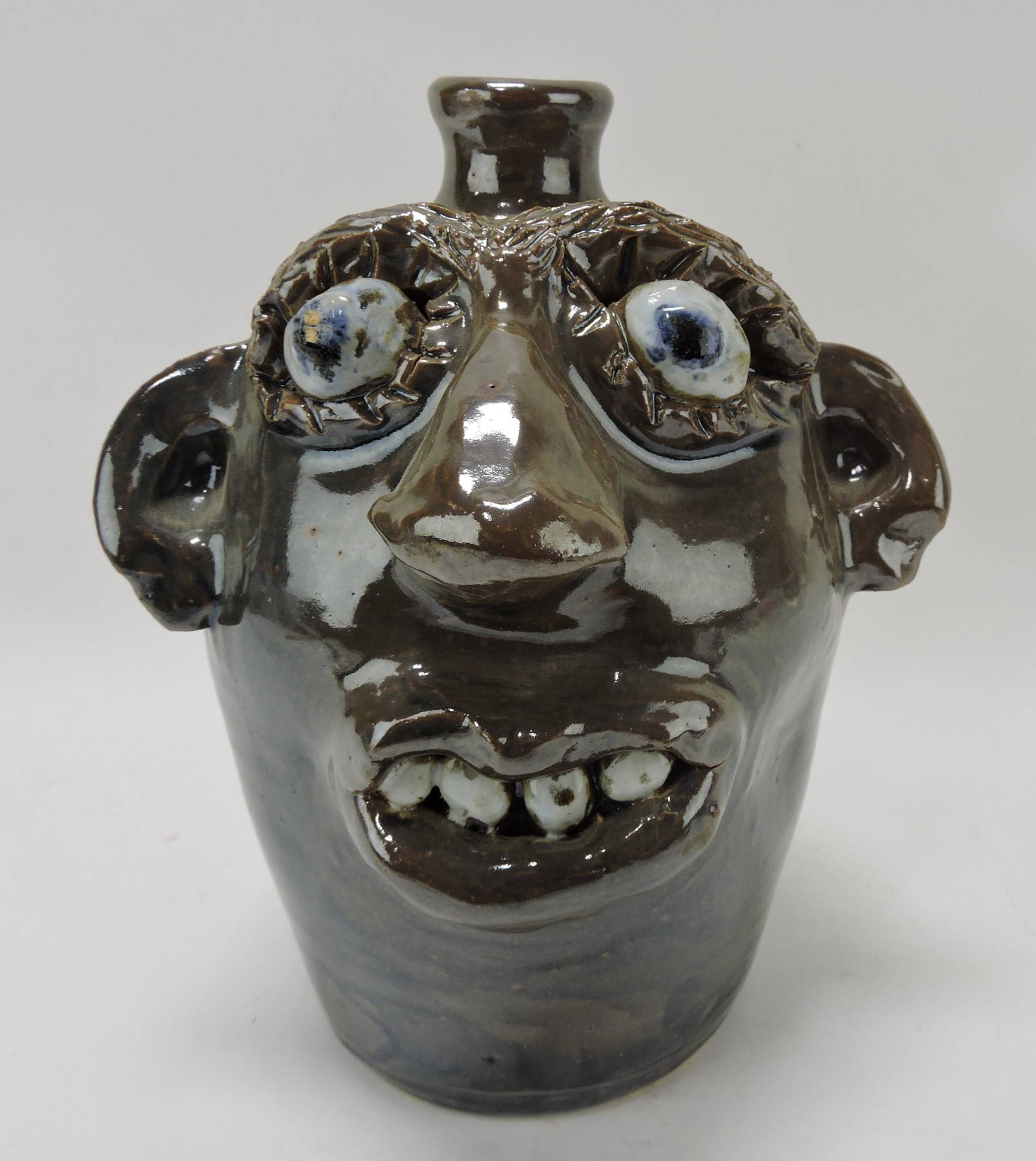 Jerry Brown Pottery Large Face Jug, Auction
