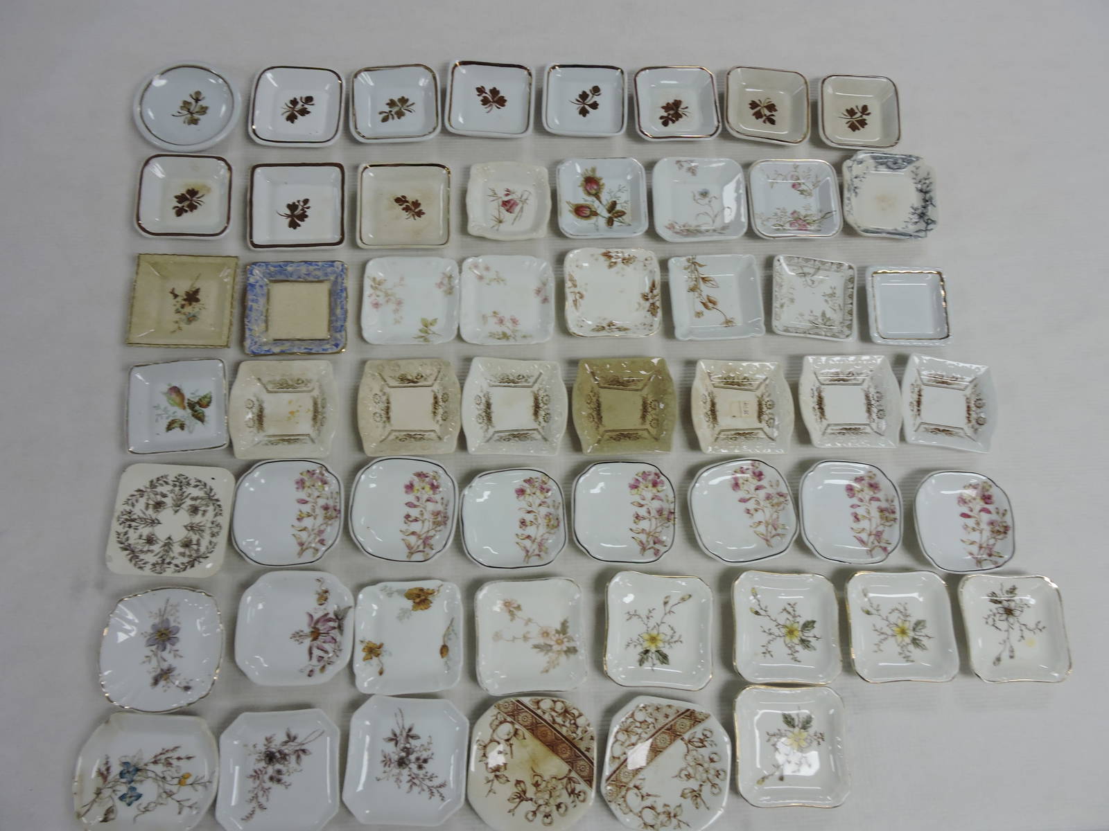 Lot Of 54 Square Butter Pats Auction
