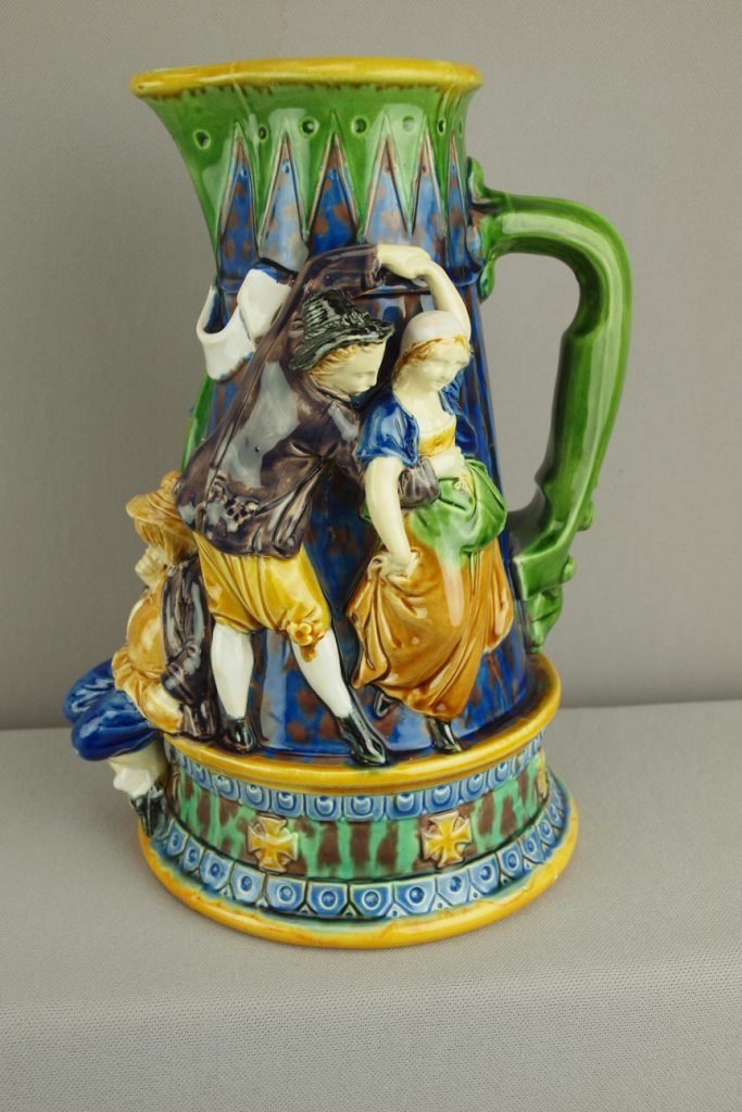 MINTON majolica tavern jug with figures in high relief,