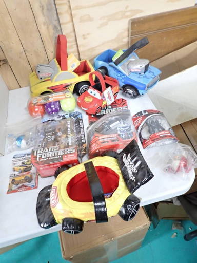 Toy Lot Including Transformers, Hot Wheels Plush Baskets, Matchbox Eggs ...