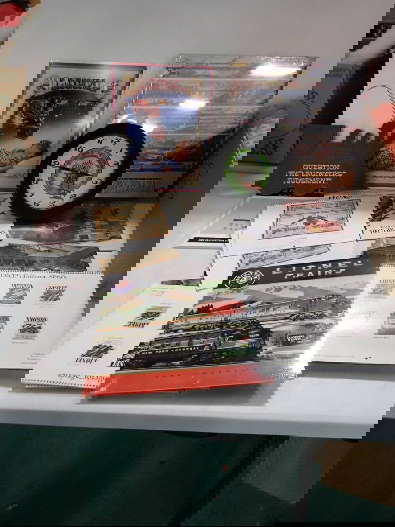Lot Of Train Items Incl Lionel Trains Metal Signs, Calendars, Etc Auction