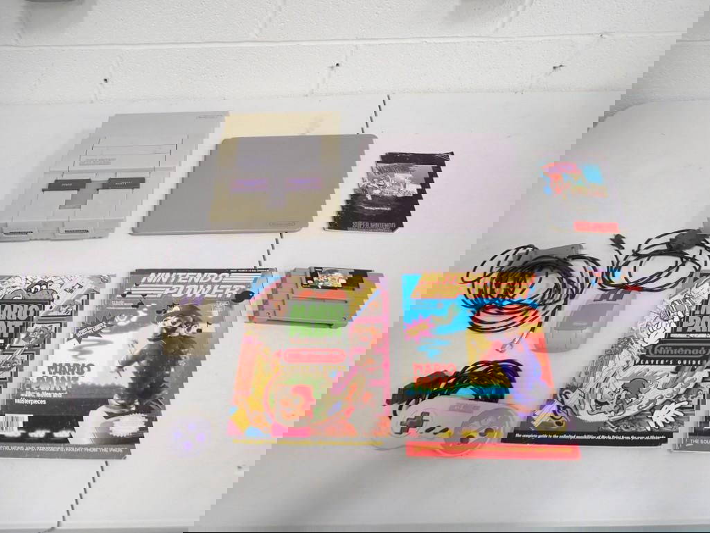 Super Nintendo Lot Including System, Mouse, Mario Paint, Nintendo Power ...