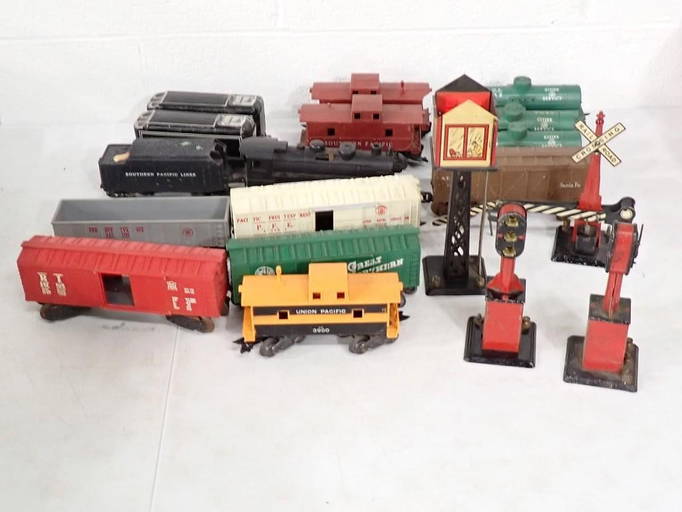 Vintage Marx Trains Including Locomotive With Tender, 13 Freight Cars ...