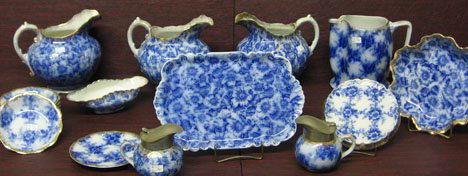 254: Twenty piece Warwick Pansy" pattern flow blue pott