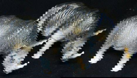 Two Porcelain Rhino Figures, Marked 'cervit', L